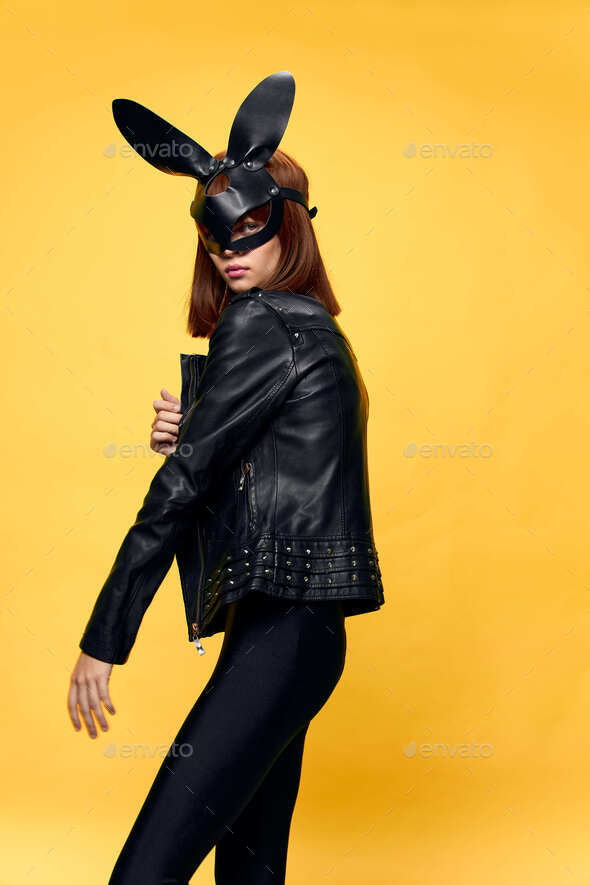 Sexy woman in rabbit mask and black suit, temptation Stock Photo by ...