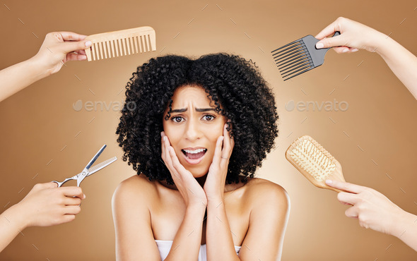 Brush, scared and portrait of woman in a studio with curly, natural and ...