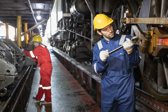 Engineer train Inspect the train's diesel engine, railway track in ...