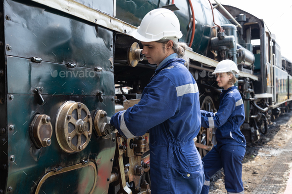 Engineer train Inspect the train's diesel engine, railway track in ...
