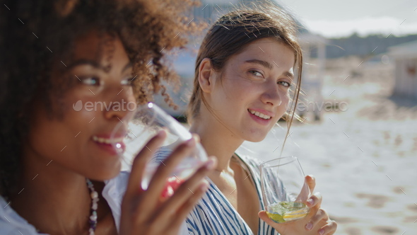 Flirting beach girl posing in summer sunlight closeup. Attractive lgbt ...