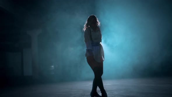 Woman dancing in the fog, Stock Footage | VideoHive