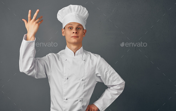 male chef cooking food hand gestures restaurant food preparation ...