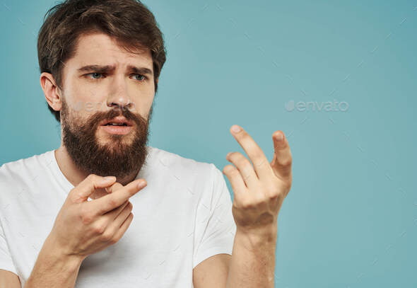 Man indignant look portrait emotions blue background model Stock Photo ...
