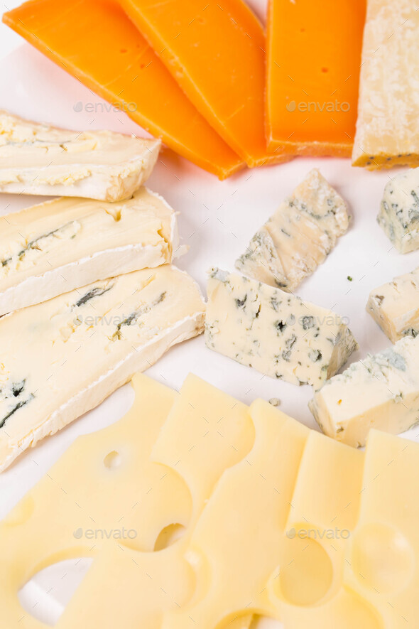Various types of cheese composition. Stock Photo by indigolotos | PhotoDune