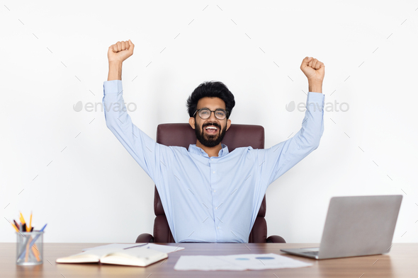 Excited Indian Businessman Achieving Virtual Milestone, White ...