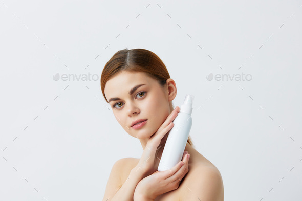 pretty woman body lotion rejuvenation cosmetics light background Stock ...