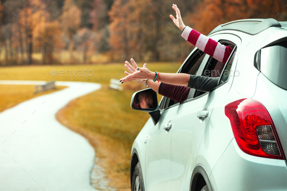 hands out of a car window Stock Photo by azgek | PhotoDune