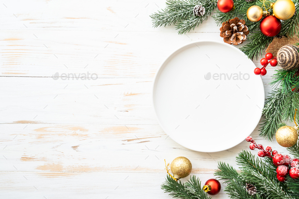 Christmas table with holiday food background. Stock Photo by Nadianb