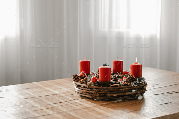 Cozy modern home with advent wreath on dining table. Celebrating time ...