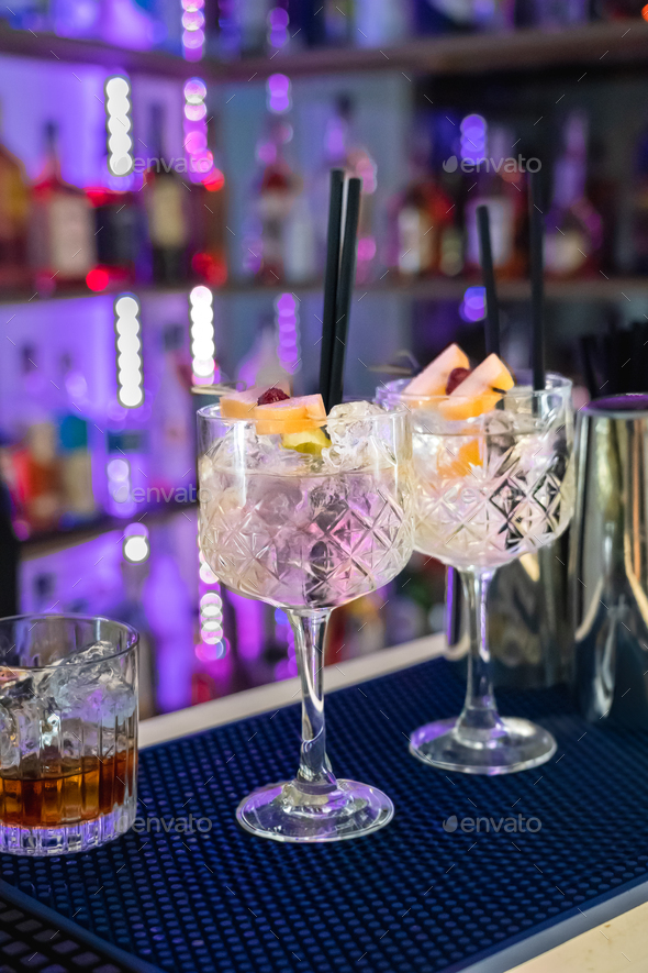 Assortment fresh cocktails on the bar counter. bar background Stock ...