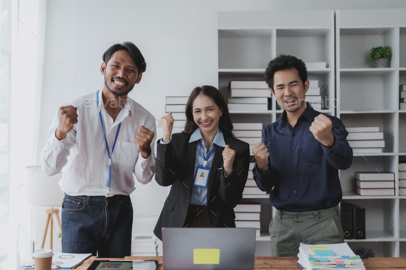 business people raising his hand to congratulate excited and happy at a ...