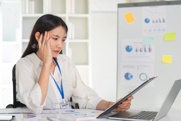 Puzzled confused asian woman thinking hard concerned about online ...