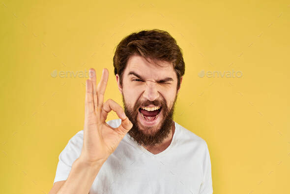 Bearded man emotions fun gesture with hands white t-shirt close-up ...