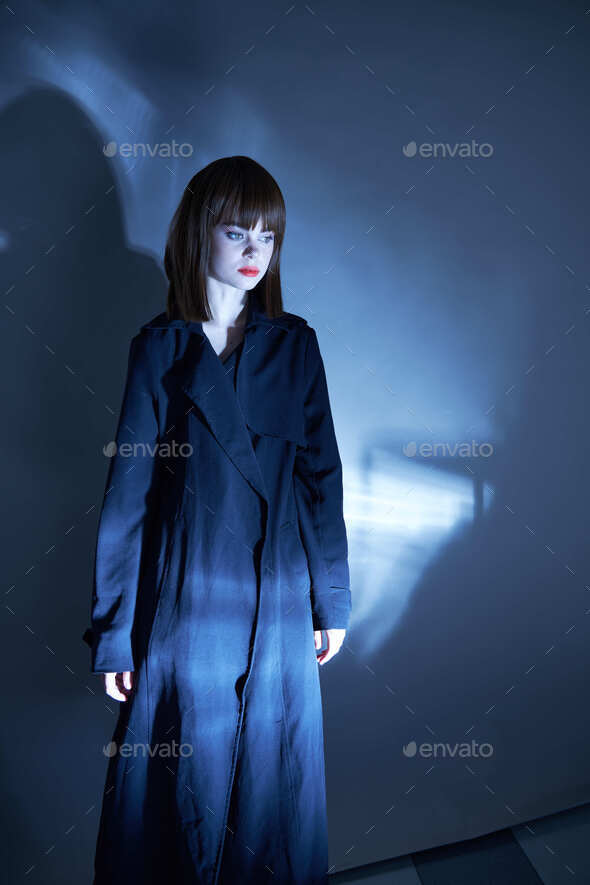fashion model coat dark isolated background blue color Stock Photo by ...