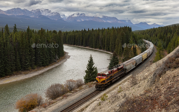 Train in a Mountain Valley in Banff National Park Stock Photo by ...