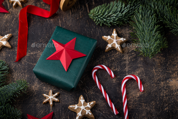 Christmas gift box with candy and star. Stock Photo by furmanphoto