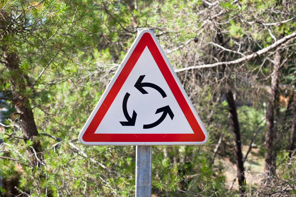 Roundabout traffic sign Stock Photo by nzooo | PhotoDune