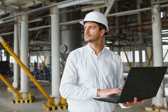Factory manager in inspection of manufacturing. Man in Industrial ...