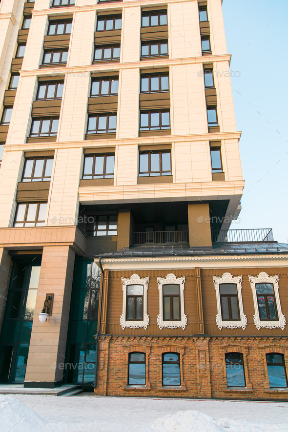 Street with houses cold weather. Snow day in winter. Building in city ...