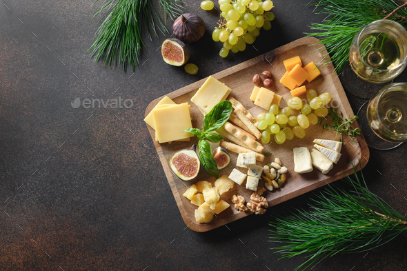 Christmas ceese platter with different cheese and appetizer. Stock ...