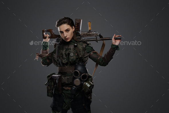 Portrait of a female soldier holding a homemade automatic rifle Stock ...