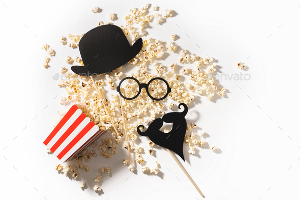 Popcorn bucket and photo booth prop for movie party on white background ...