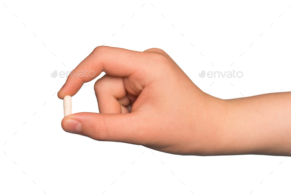 Hand holding the supplements capsule isolated on white background Stock ...