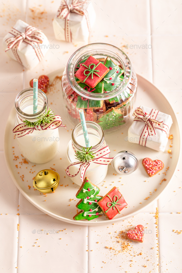 Sweet gingerbread cookies with milk at Christmas eve. Stock Photo by ...