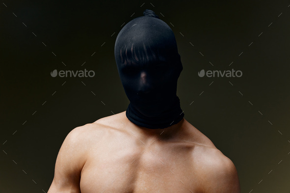 a man with pumped up muscles of the arms and a bodybuilding fitness ...