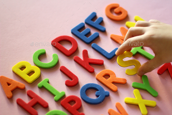 english alphabet. kid playing alphabet letters. Intellectual game ...