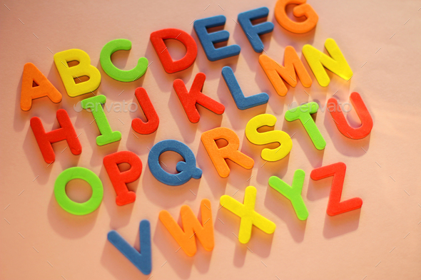 english alphabet. kid playing alphabet letters. Intellectual game ...