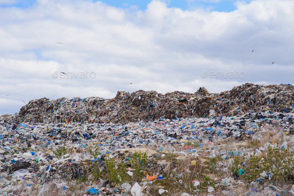 Scrap heap - Scrap Metal ready for recycling with blue sky Stock Photo ...