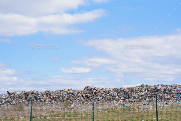 Scrap heap - Scrap Metal ready for recycling with blue sky Stock Photo ...