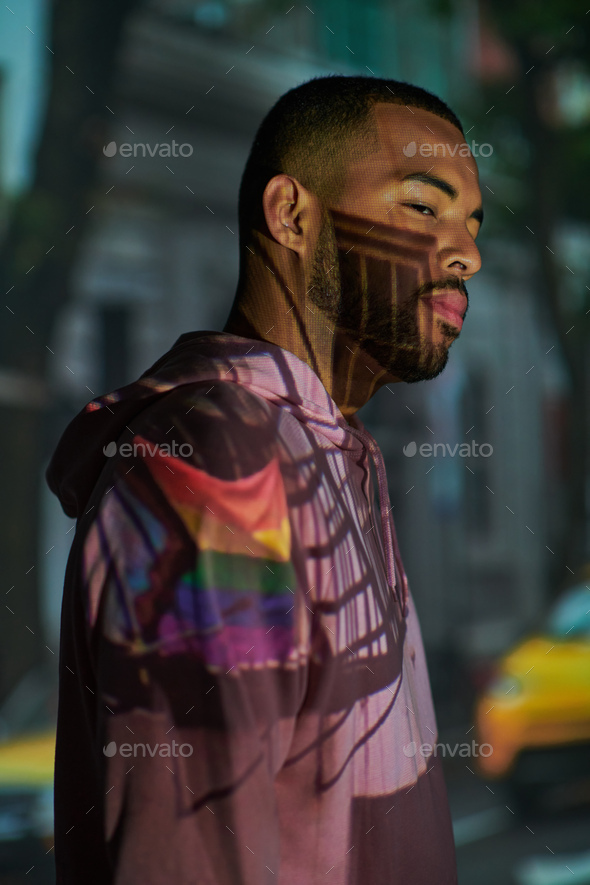 trendy african american male model posing in profile in digital ...
