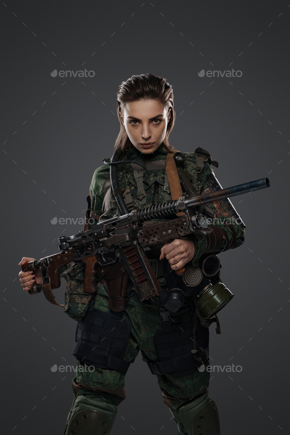 Portrait of a female soldier holding a homemade automatic rifle Stock ...
