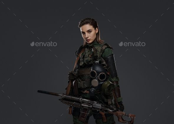 Portrait of a female soldier holding a homemade automatic rifle Stock ...