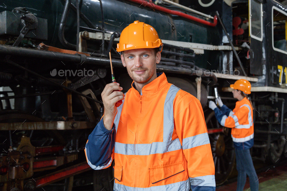 Engineer train Inspect the train's diesel engine, railway track in ...