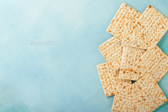 Passover celebration concept. Matzah, red kosher walnut and spring ...