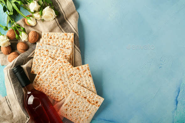 Passover celebration concept. Matzah, red kosher walnut and spring ...