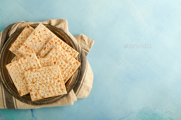 Passover celebration concept. Matzah, red kosher walnut and spring ...