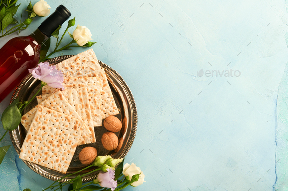 Passover celebration concept. Matzah, red kosher walnut and spring ...