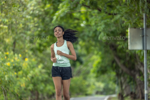 Stylish female runners in modern attire, discover serenity. Reenergize ...