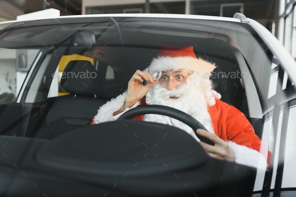 Authentic Santa Claus driving his modern car, outdoors Stock Photo by ...