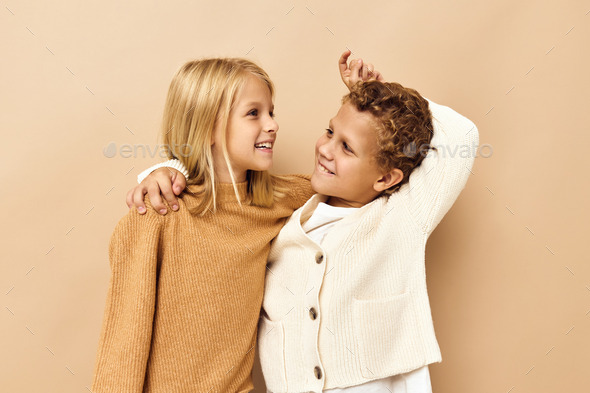 little girl and boy hug games smile friendship Studio emotions Stock ...