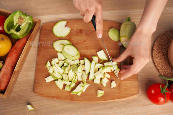 cutting vegetables healthy eating kitchen homework Stock Photo by shotprime