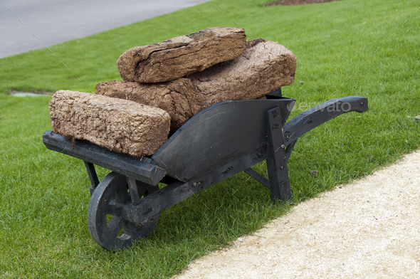 wheelbarrow with peat Stock Photo by Chris_Willemsen | PhotoDune