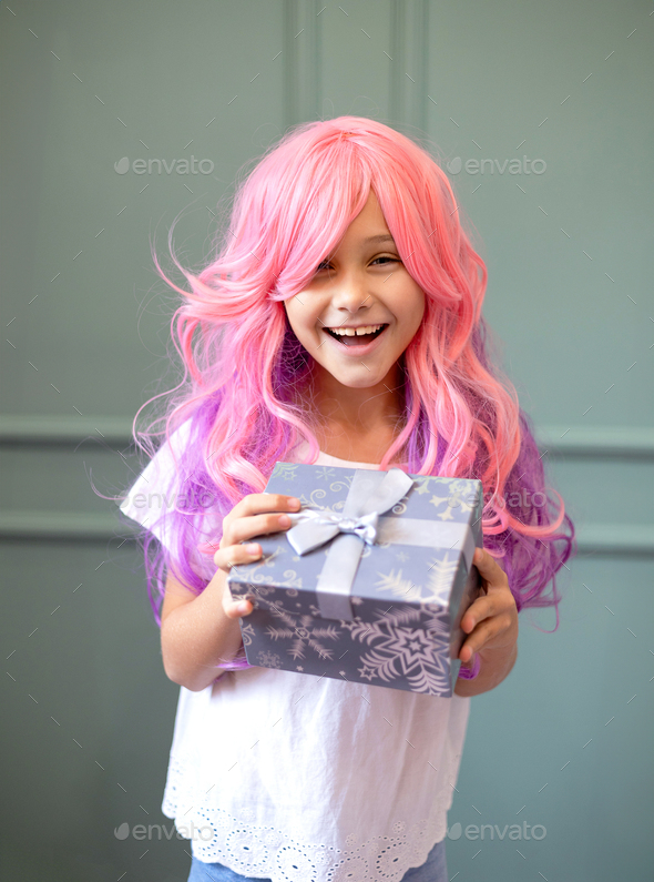 little girl with pink hair holding a gift box. Happy Vanilla Girl ...