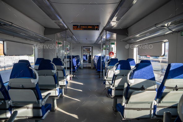 Interior of modern passenger high-speed express train. Inside the train ...