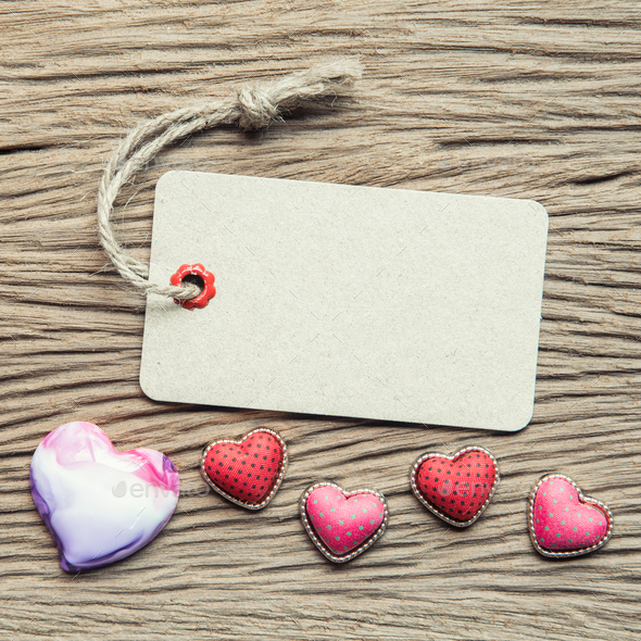 Vintage tag with hearts on wood texture for valentine and wedding ...
